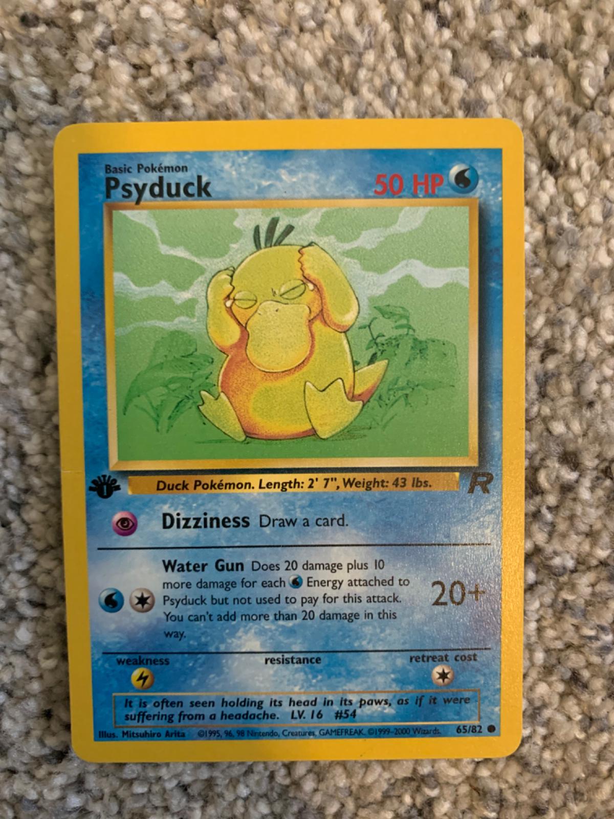 Psyduck [1st Edition] | Ungraded | Pokemon Team Rocket