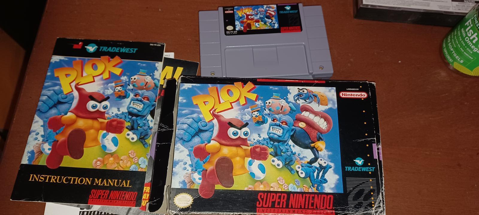 Plok | Item, Box, and Manual | Super Nintendo
